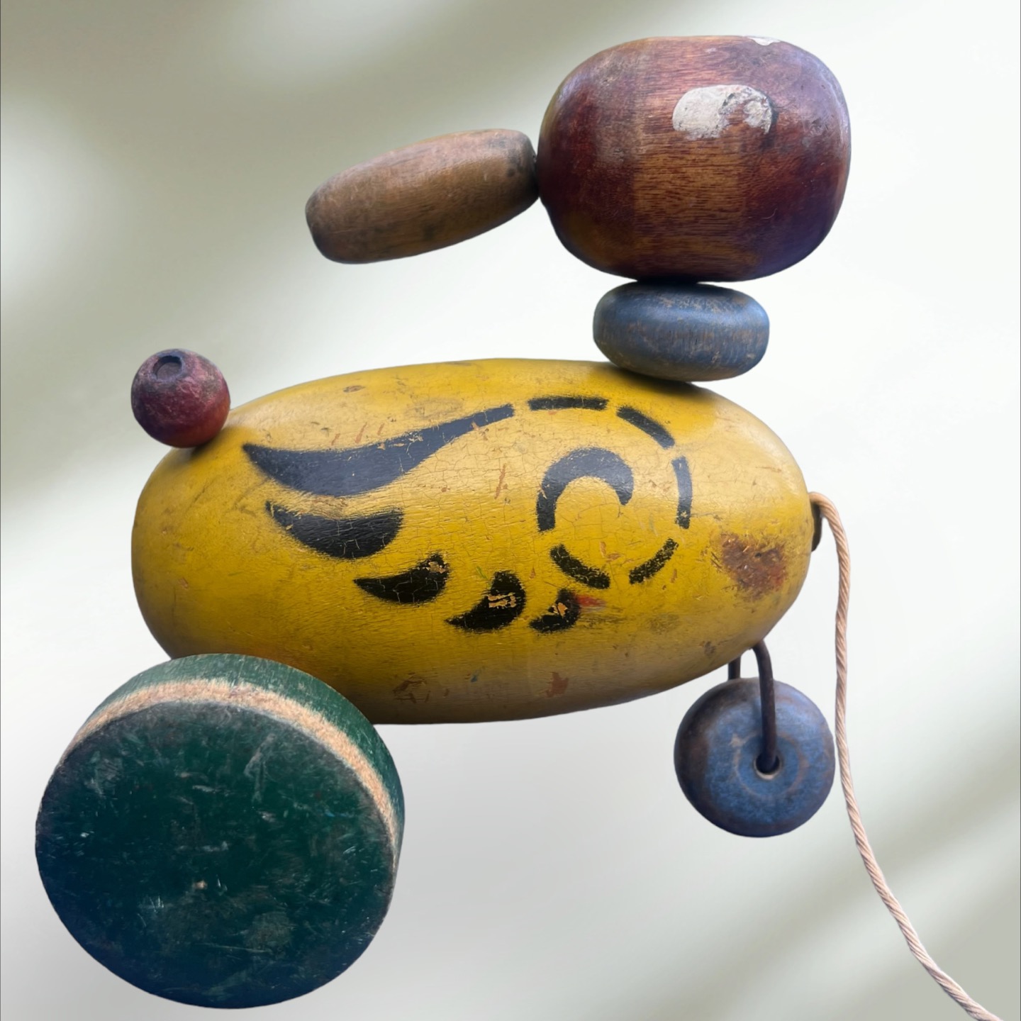 Early Primitive Wood Dolly Pull Toy