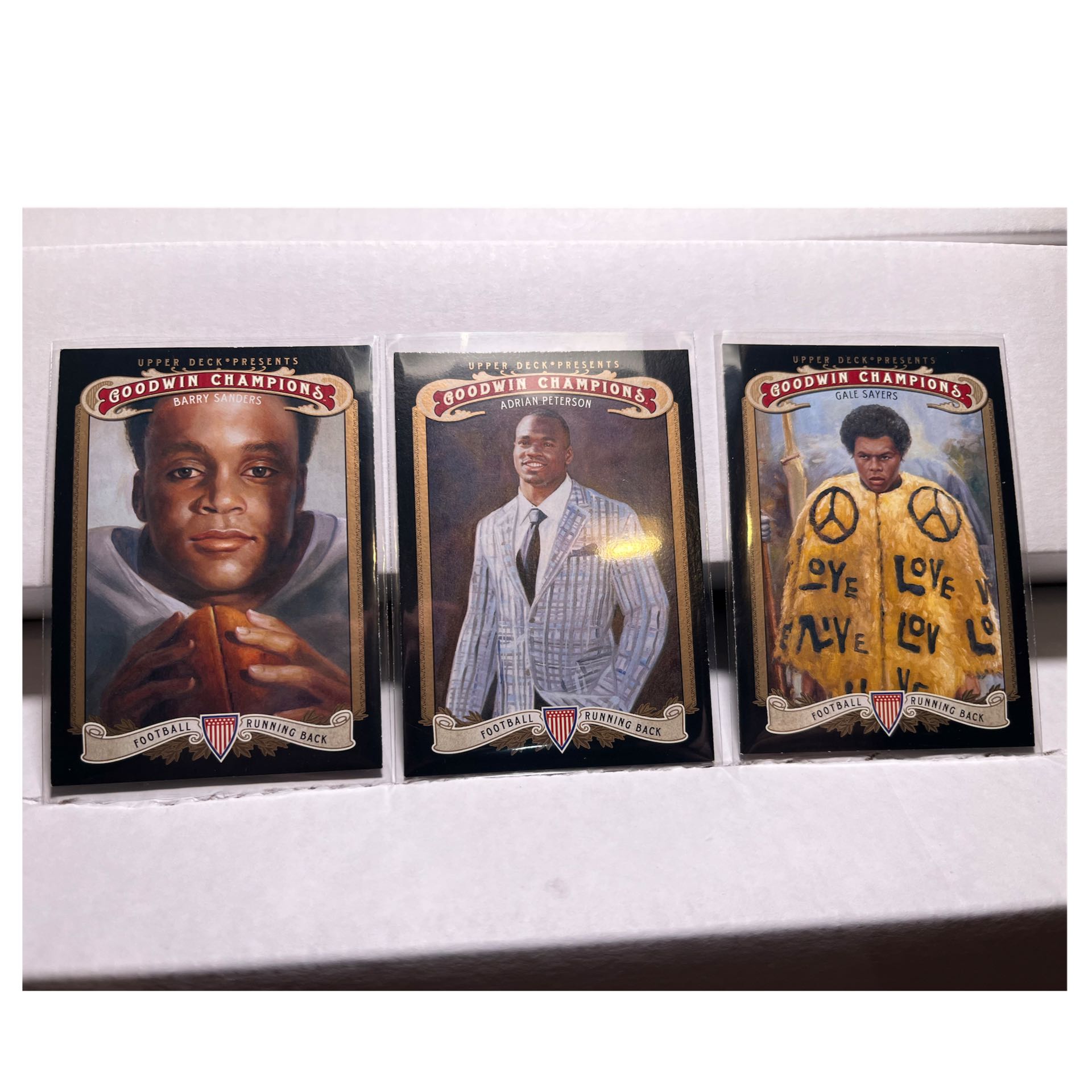 Barry Sanders, Adrian Peterson, Gayle Sayers Goodwin Champions Lions ...