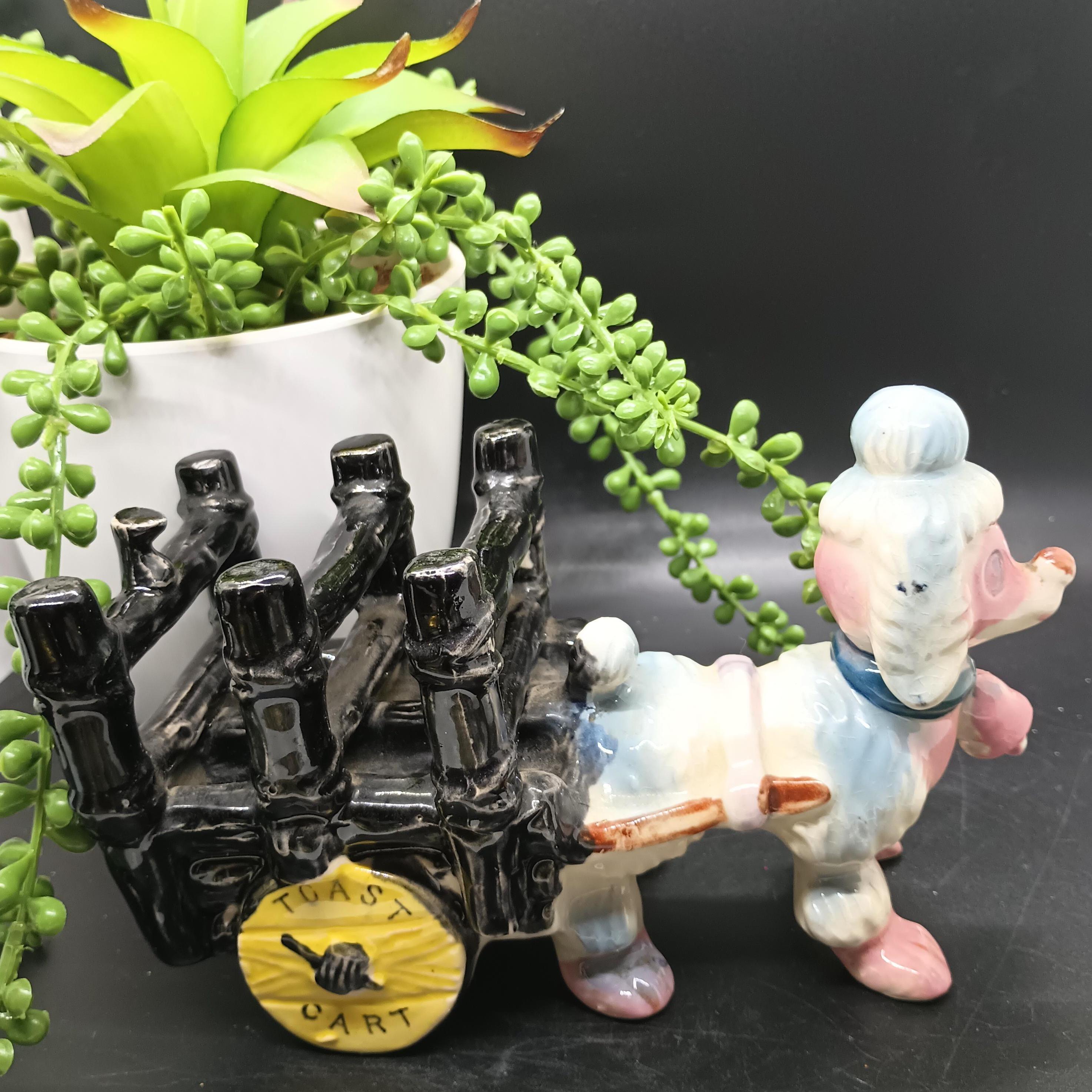 1950's Toast Cart with Pink, Blue & White Poodle. Wheels on cart say ...