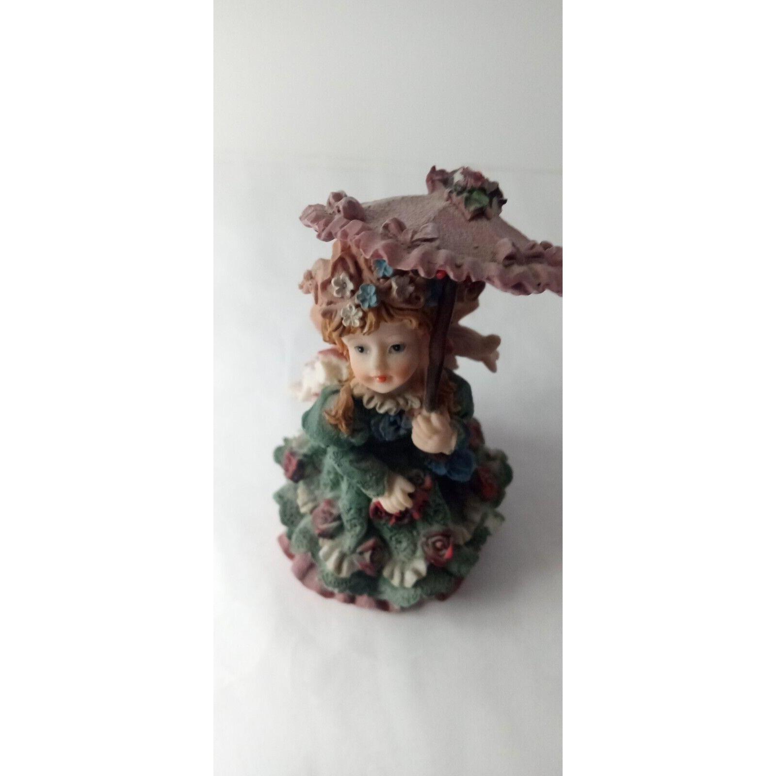 victorian style resin girl figurine