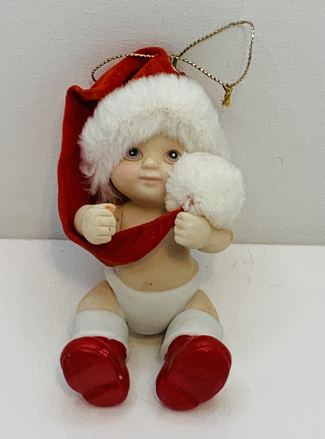 Christmas Baby Porcelain Face Figurine With Santa Hat