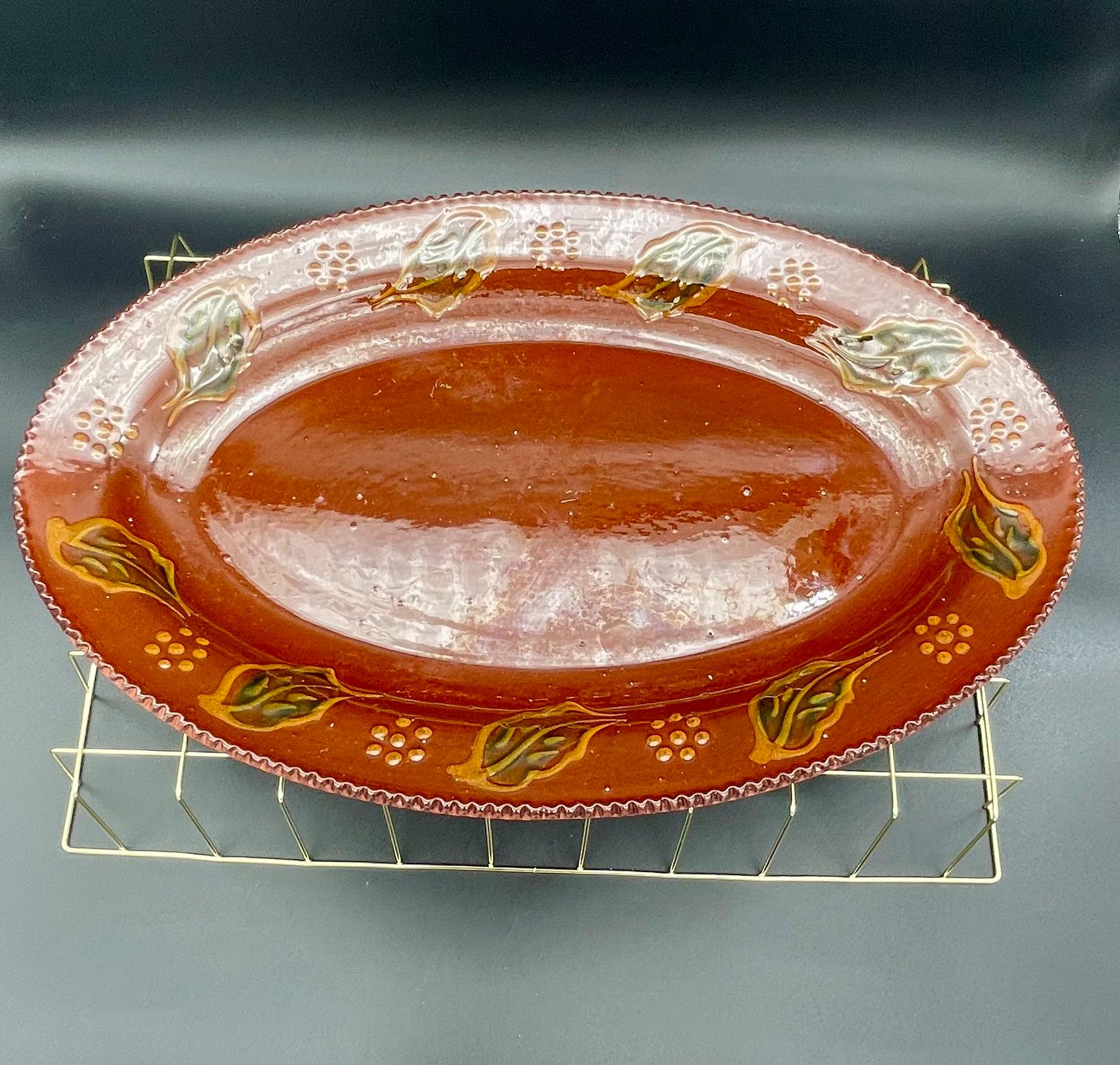 Vintage CN Foltz Pottery red ware small oval platter.