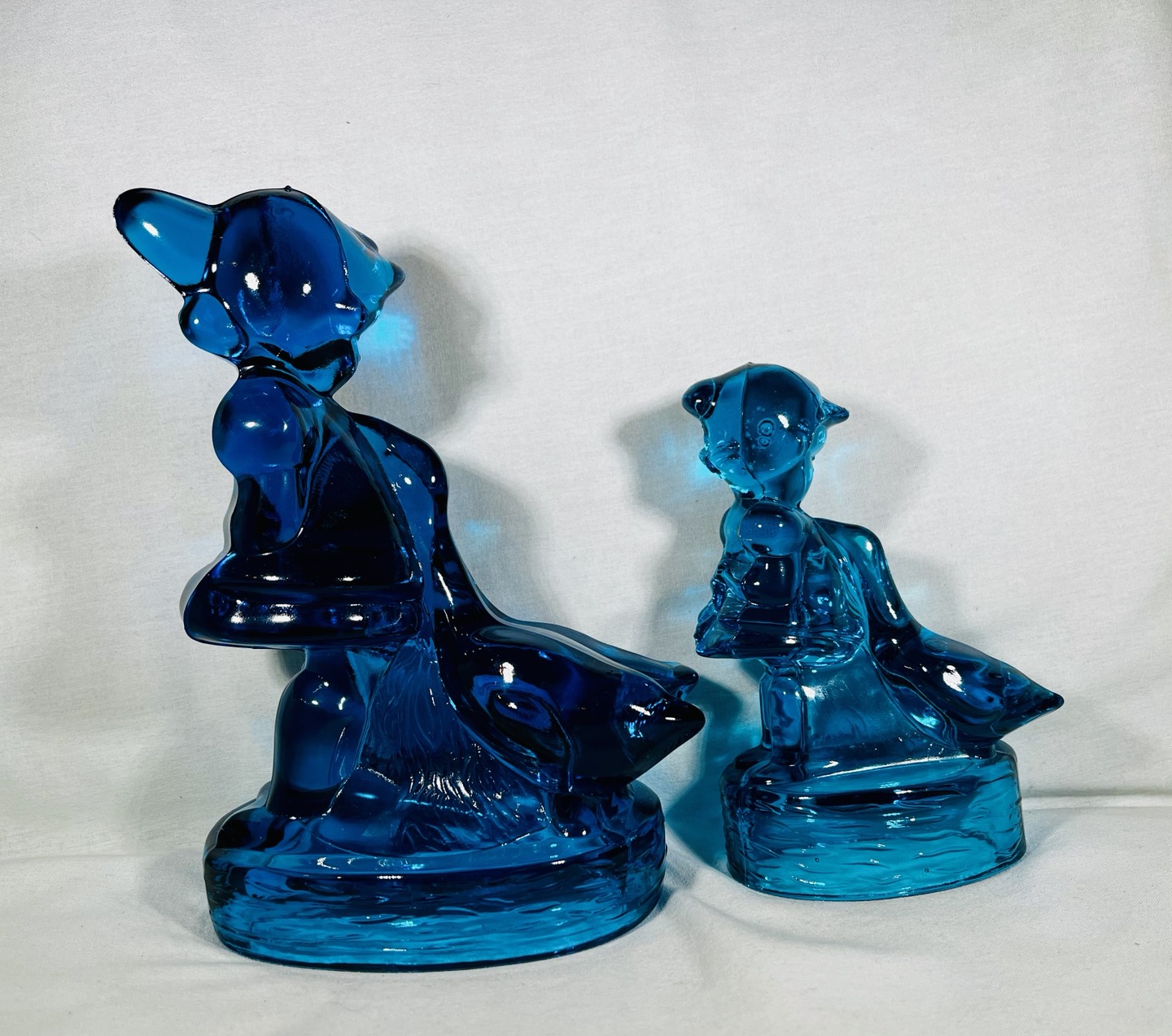 Pair Of LE Smith Blue Glass Girl With Geese Figurines