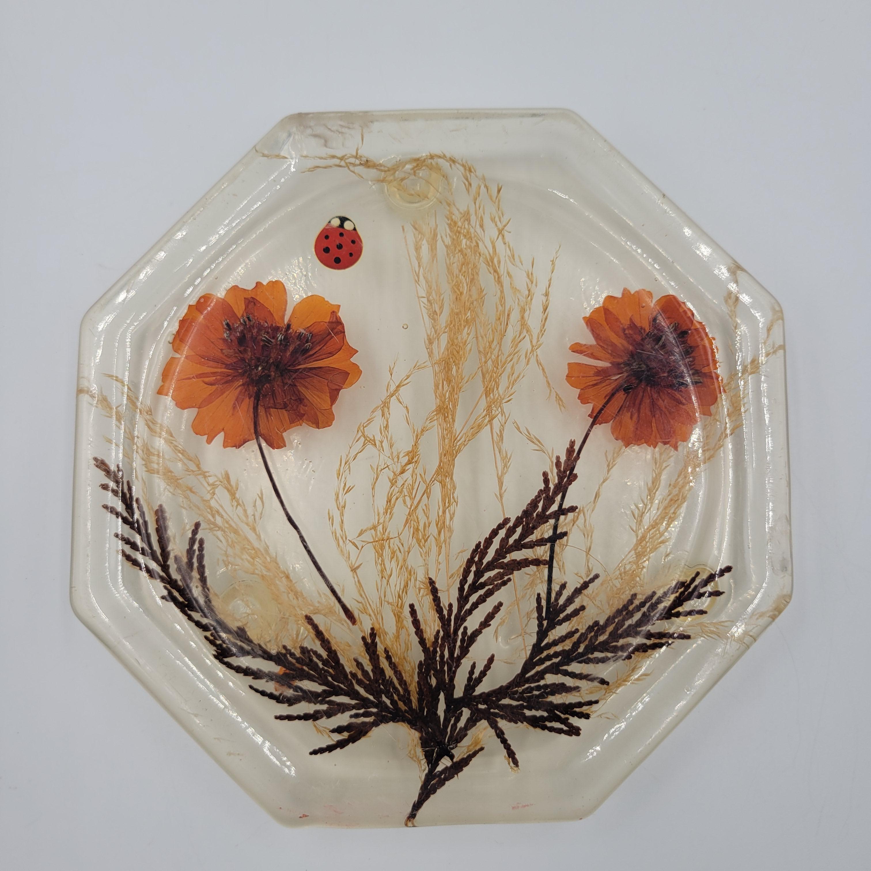 Lucite Octagon Shape 3 Footed Trivet With Flowers And A Lady Bug