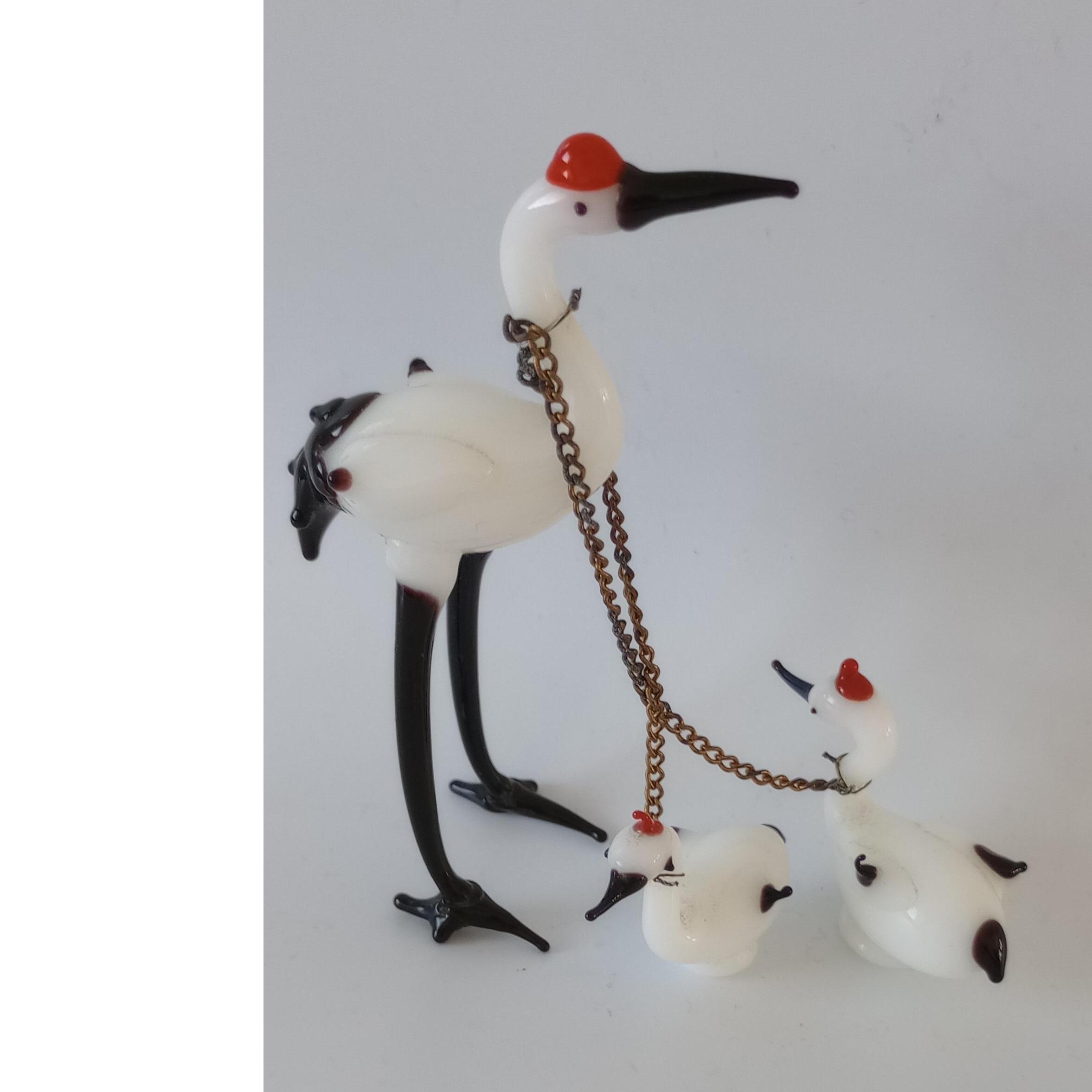 Handblown glass Stork and family